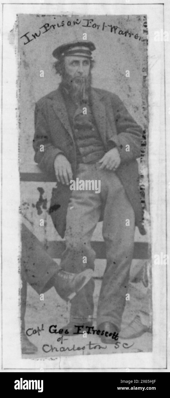 Capt. George F. Frescott, full lgth., standing, facing right, in prison ...