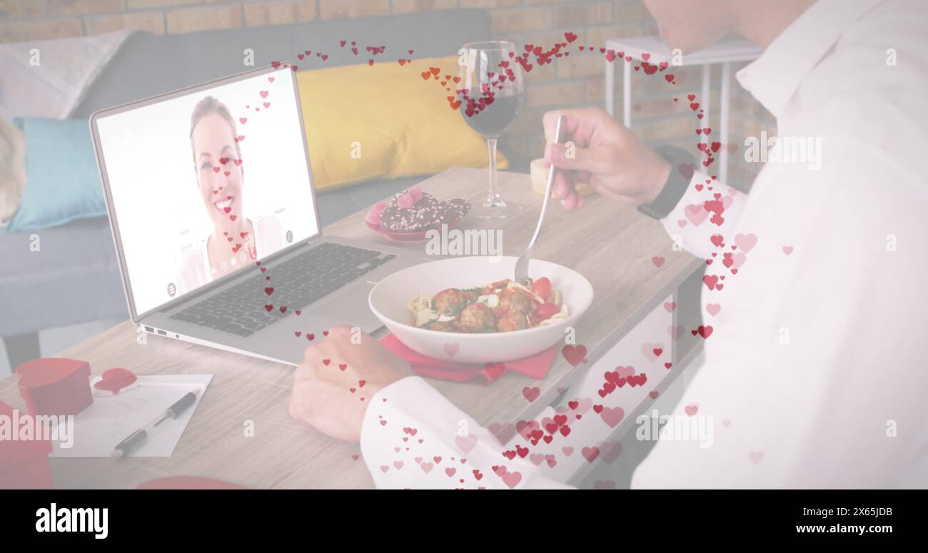 Caucasian couple enjoying virtual dinner date Stock Photo - Alamy