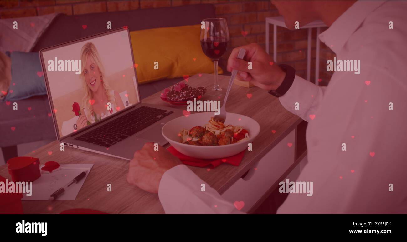 Caucasian couple enjoying virtual dinner date, boyfriend holding wine ...