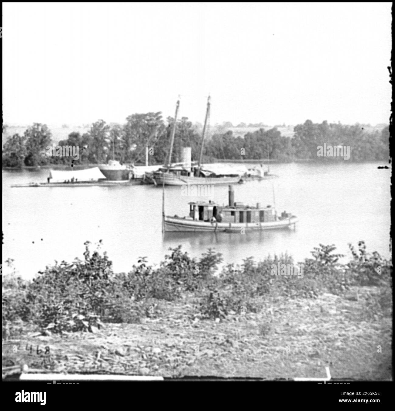 James River, Va. U.S.S. monitor Canonicus taking on coal from a ...