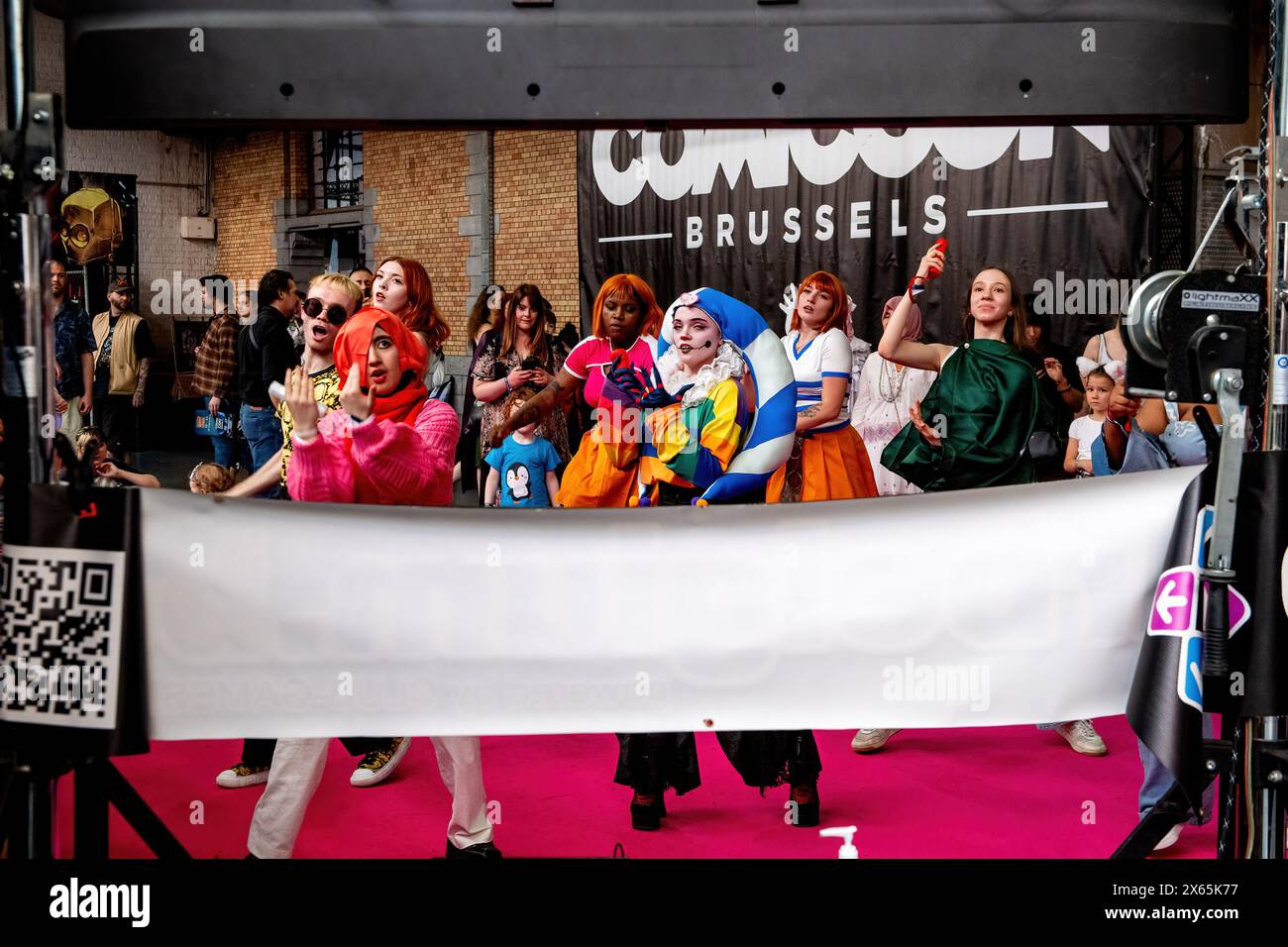 Cosplayers dance their hearts out in costume at Comic Con Brussels 2024. Cosplay enthusiasts and ...