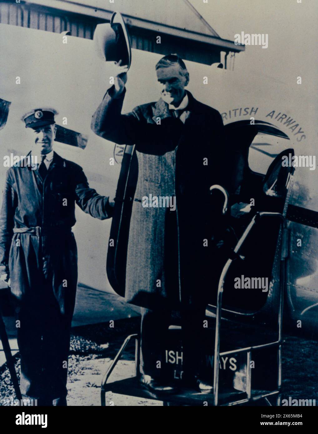 British politician and PM Neville Chamberlain arrives home from Munich ...