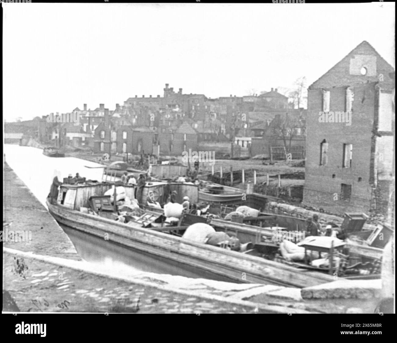 Richmond, Va. Barges with African Americans on the Canal; ruined ...