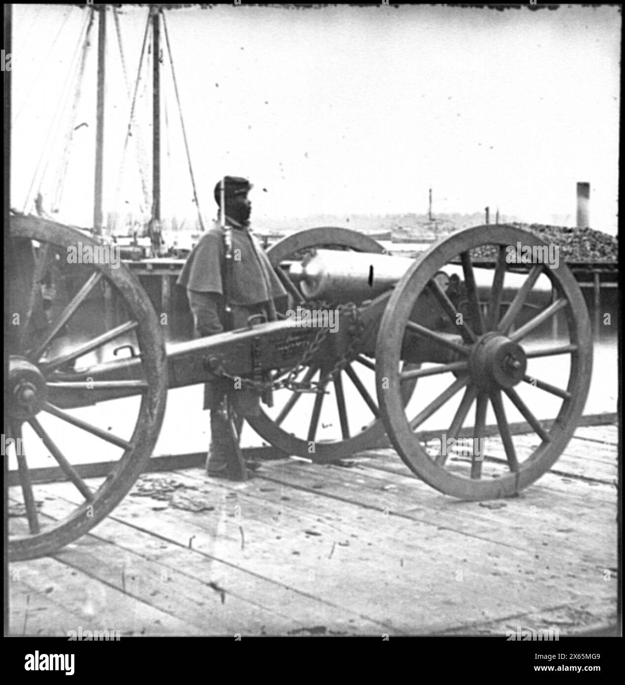 City Point, Virginia. African American soldier guarding U.S. Model 1857 12-pdr. Napoleon ...