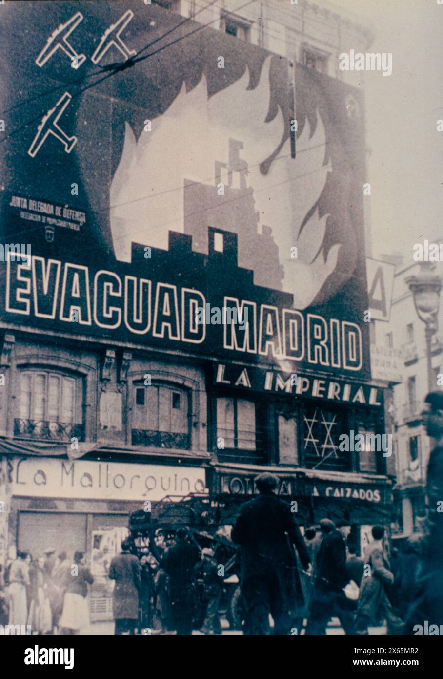 Spanish poster Evacuate Madrid during the Spanish Civil War, Spain 1937 ...