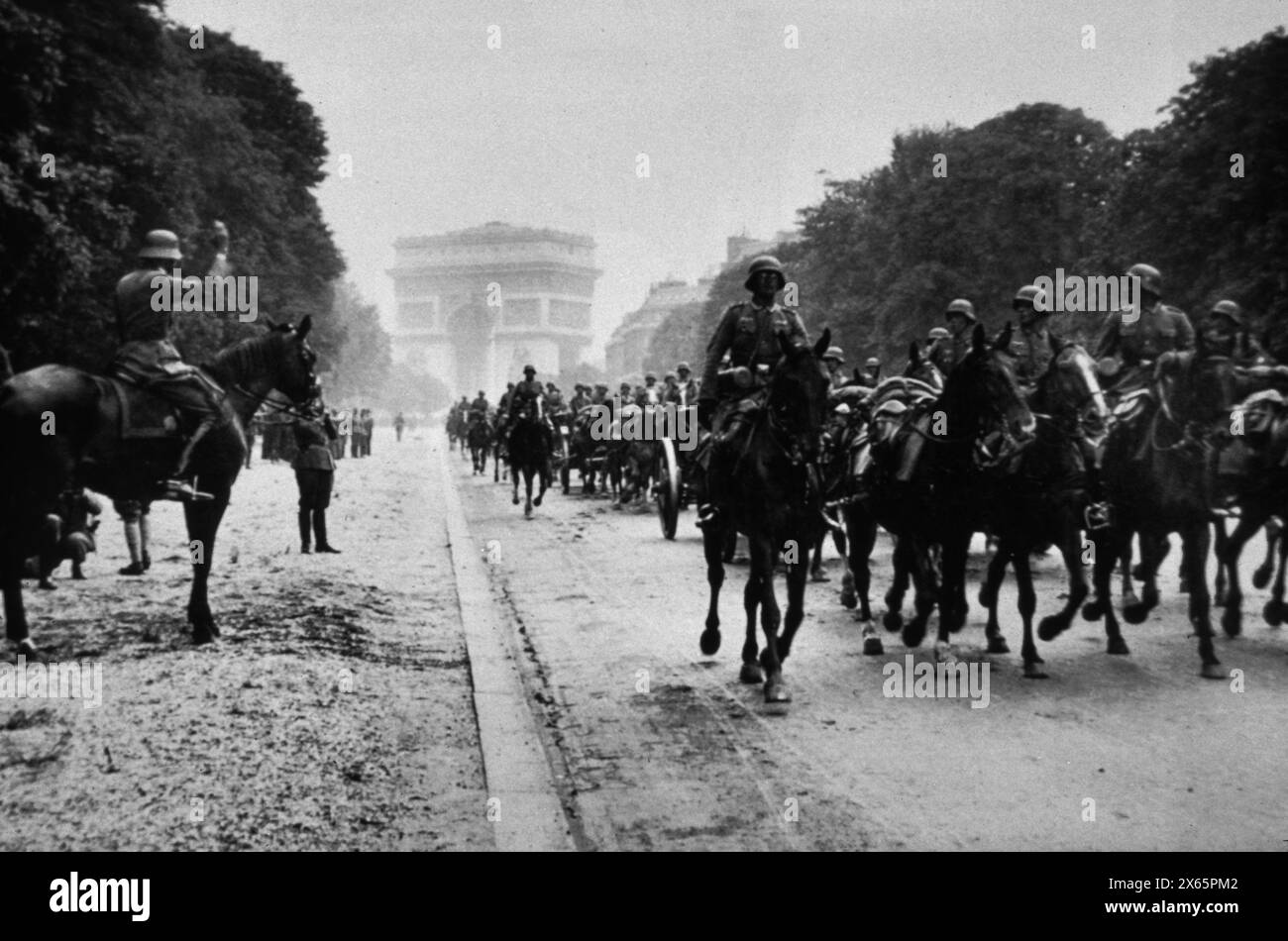 The German Army marching in Paris, France 1940 Stock Photo - Alamy