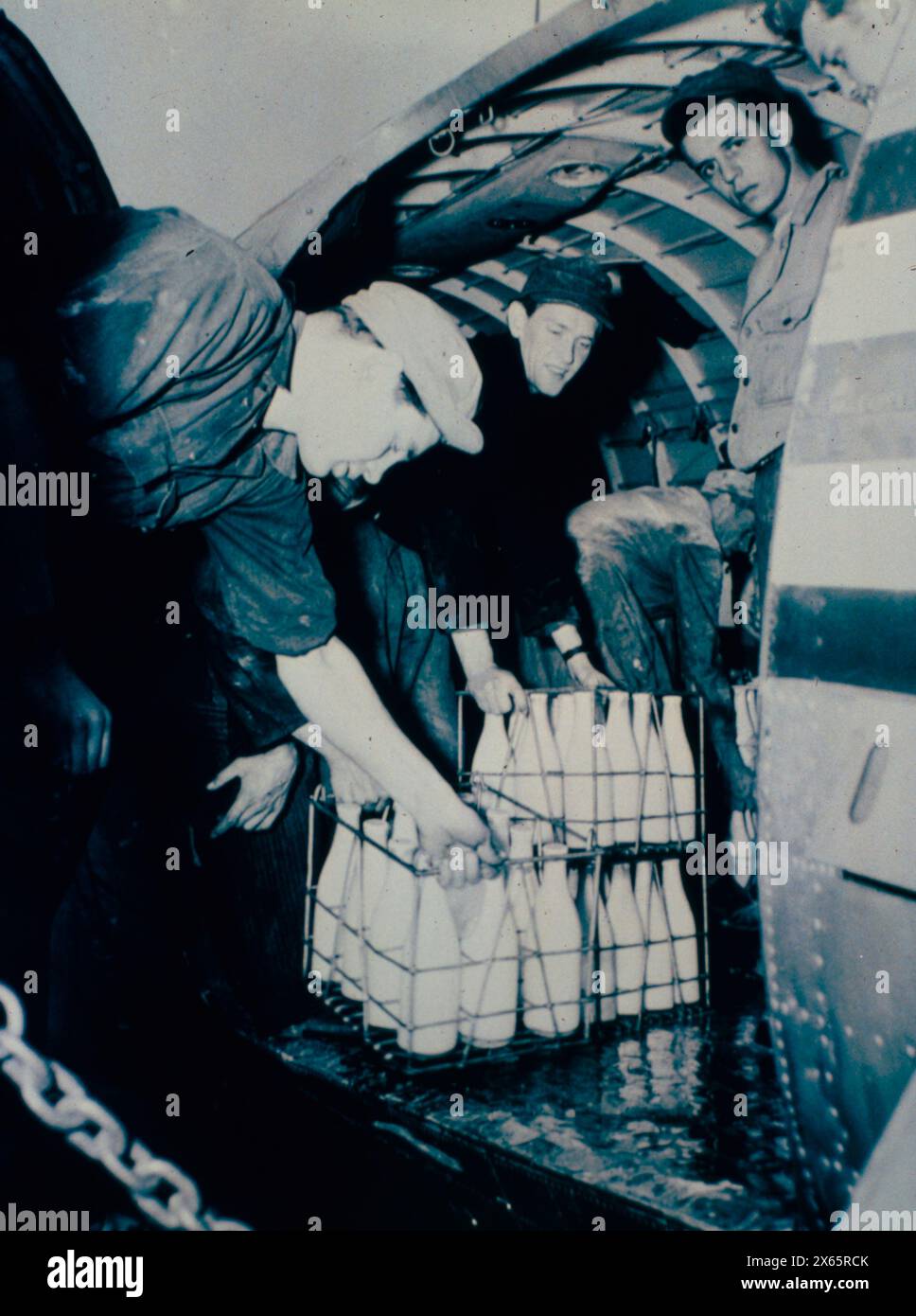 Unloading milk during the Berlin airlift to avoid the Soviet blockade ...