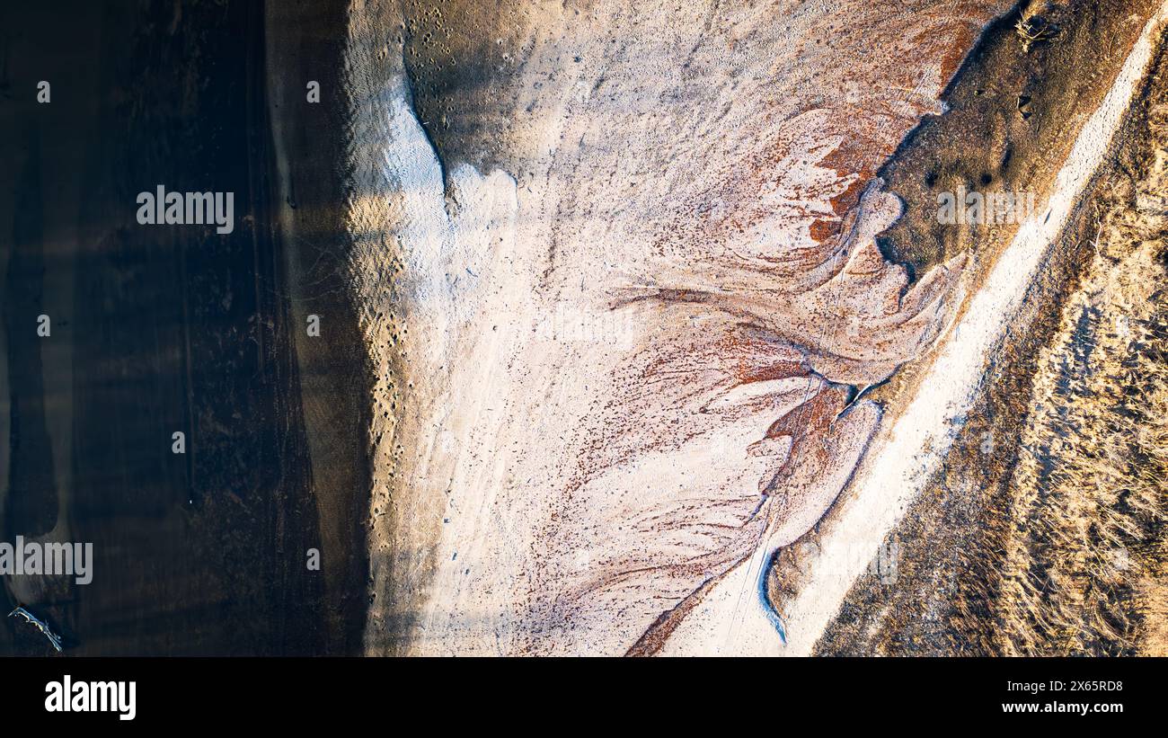 Ethereal Aerial View: River Meets Sands on Iowa's Riverside Journey ...