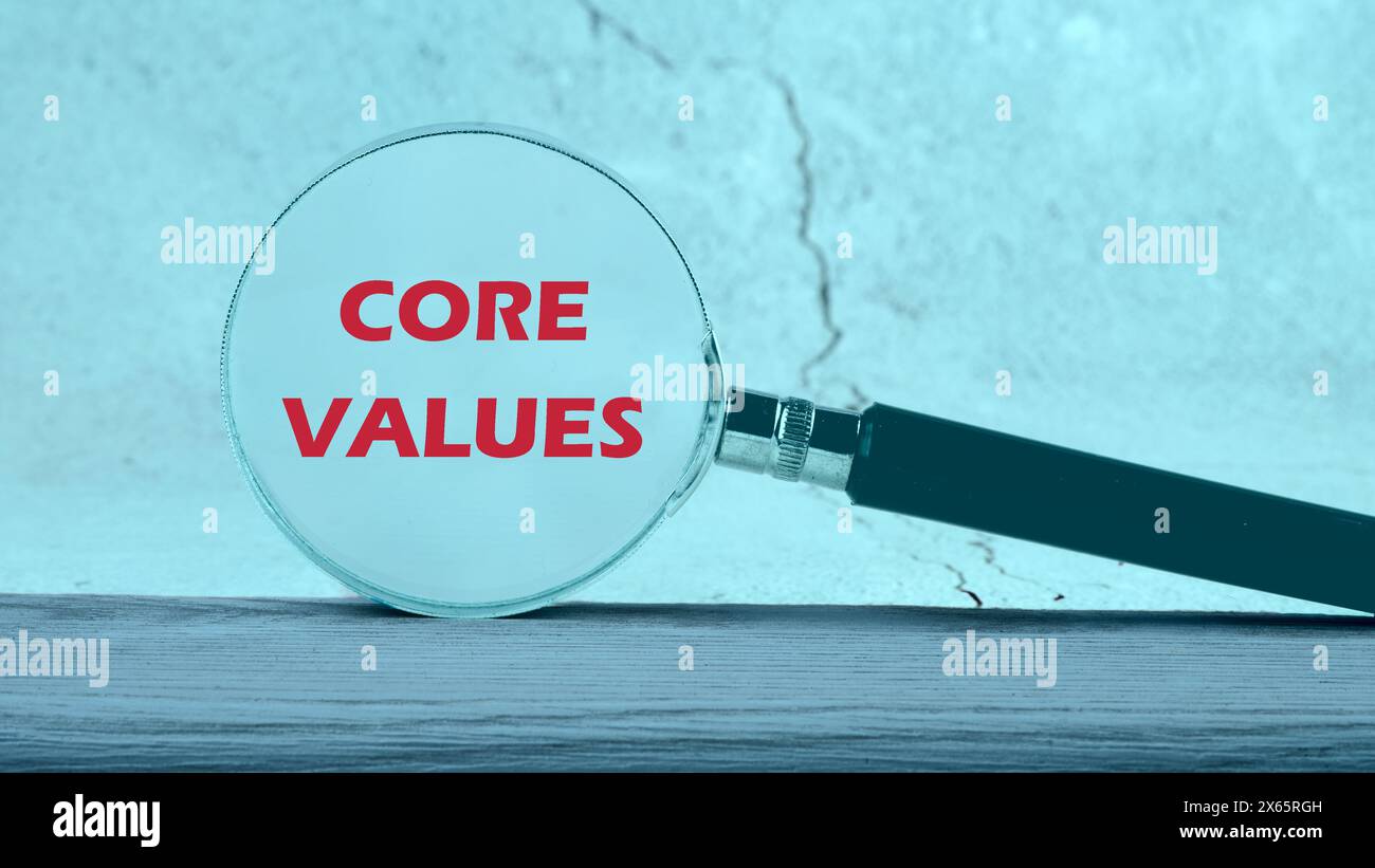 CORE VALUES. ethics concept, text through a magnifying glass on an ...