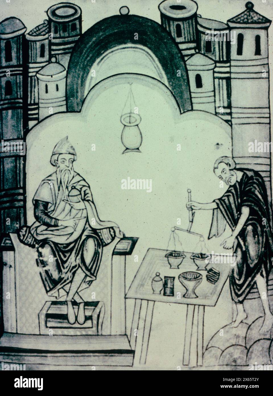 Compounding herbs, illustration from the 12th century Stock Photo - Alamy