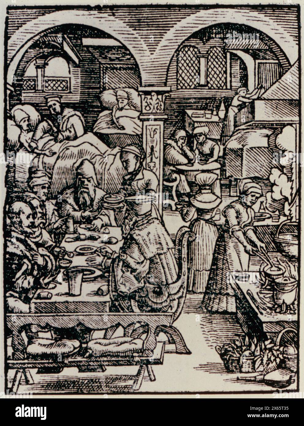 Doctors of Salerno dining, patients in background, woodcut from the ...