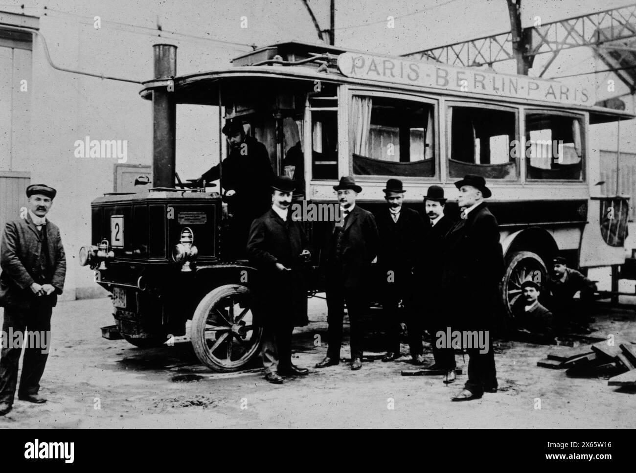 Steam omnibus en route Paris-Berlin, France 1900s Stock Photo - Alamy