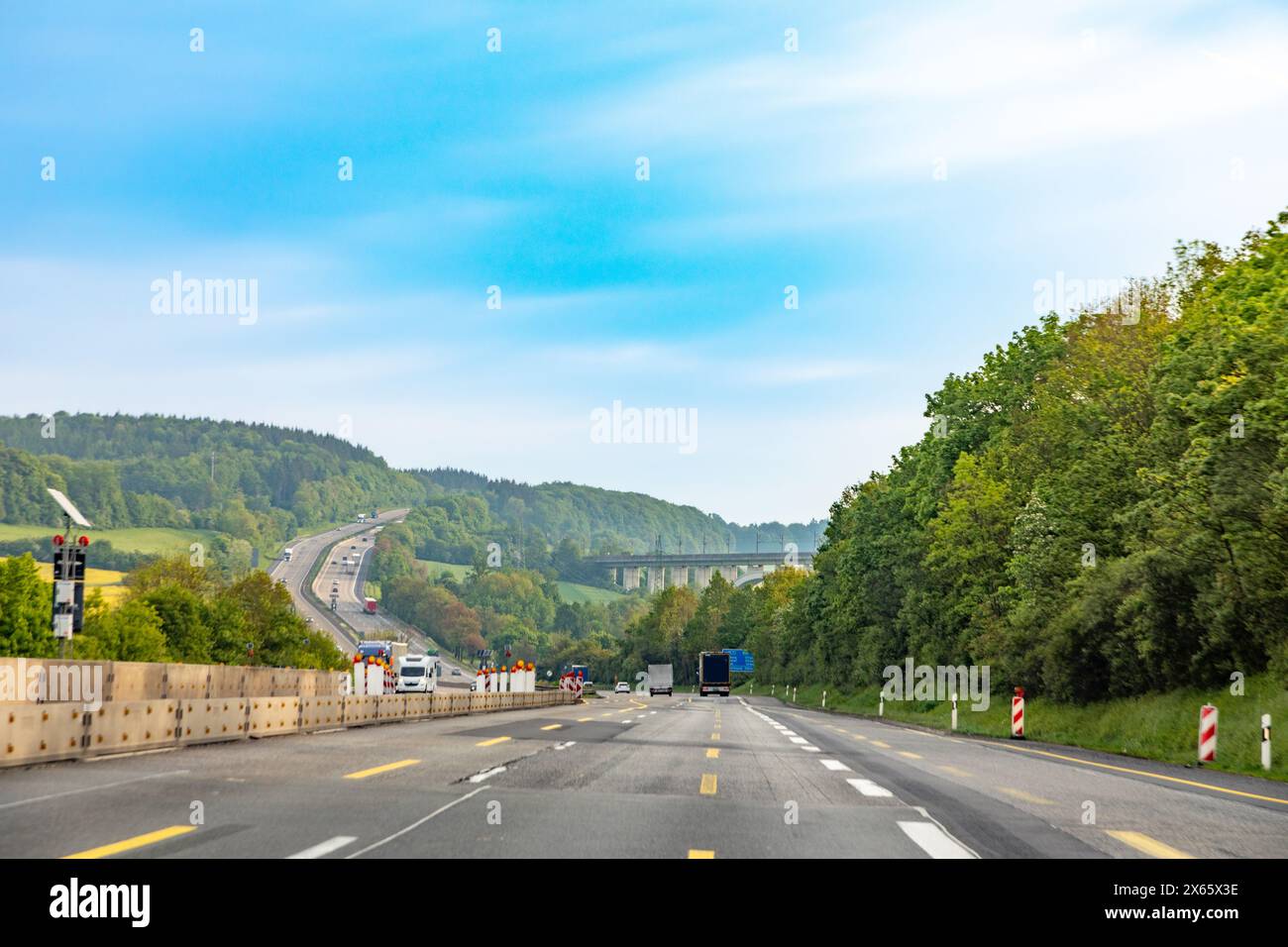driving along the Highway A7 direction Kirchheimer crossing in hilly ...