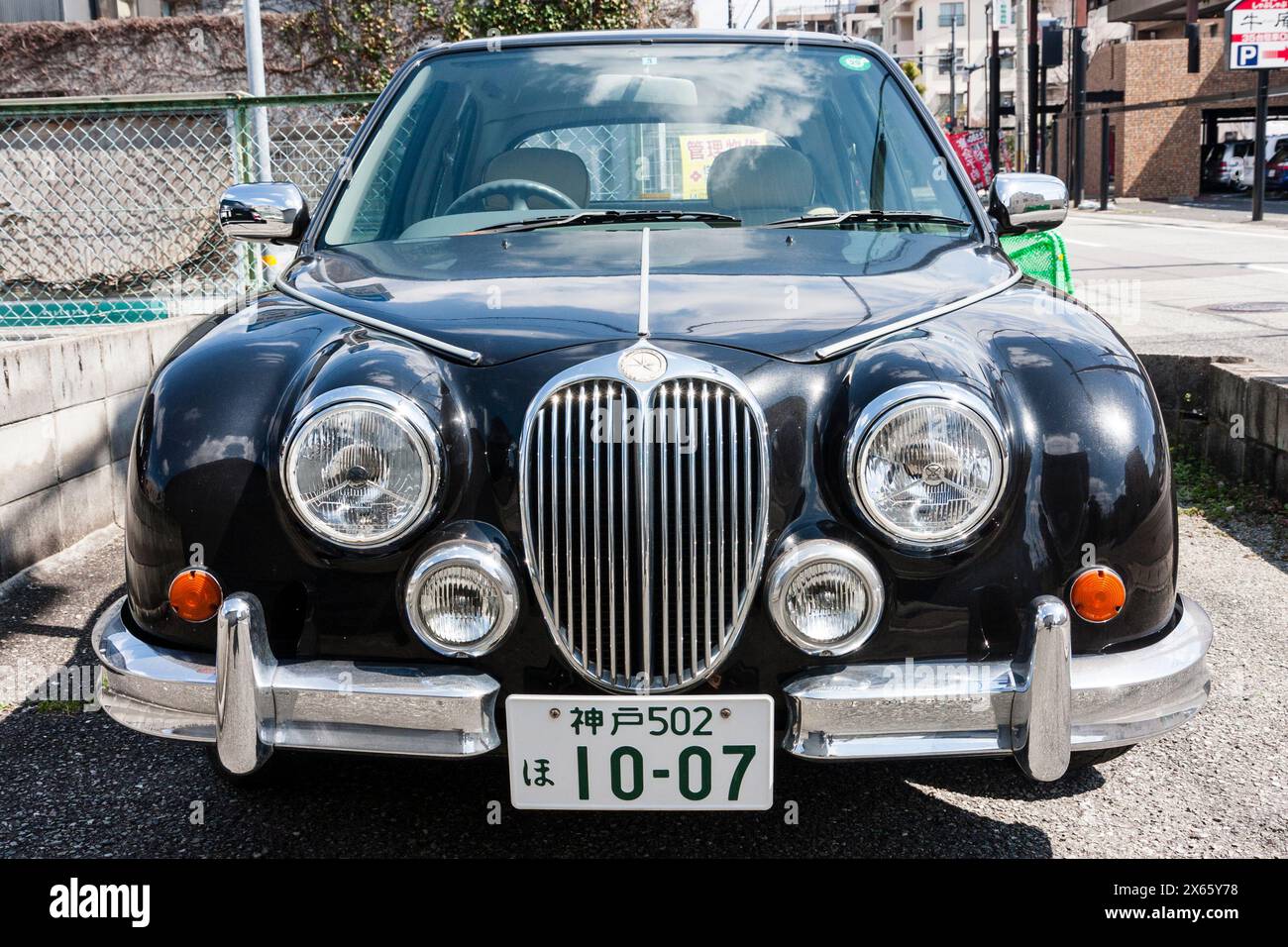 Front view of a black Mitsuoka car, Viewt model, parked in the sunshine ...