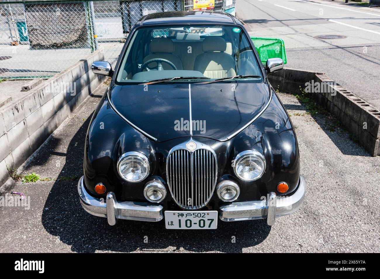 Front view of a black Mitsuoka car, Viewt model, parked in the sunshine ...