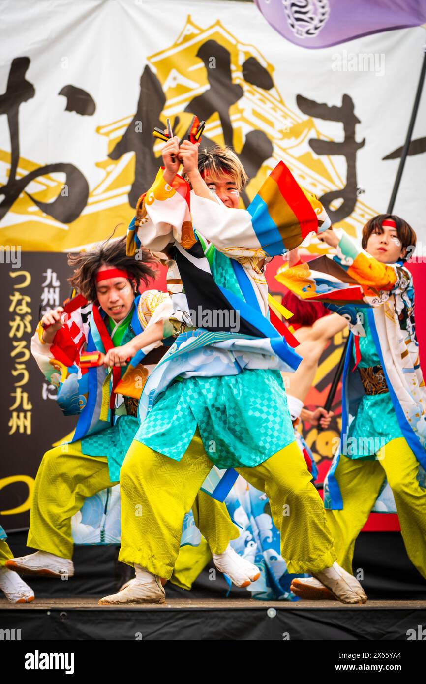 Japanese yosakoi dancers dancing on stage in long sleeve colorful ...