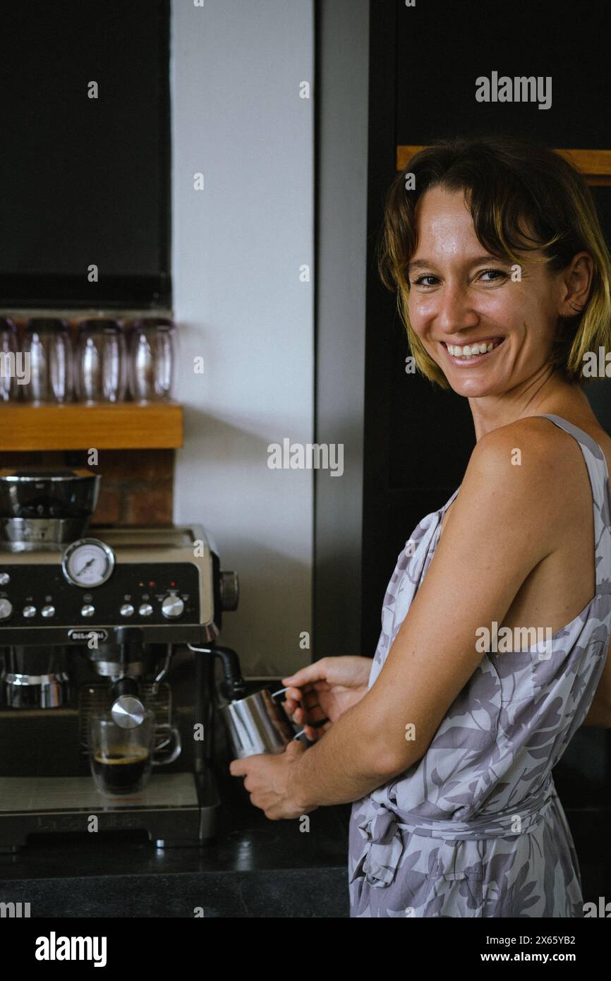 Business woman makes coffee machine hi-res stock photography and images ...