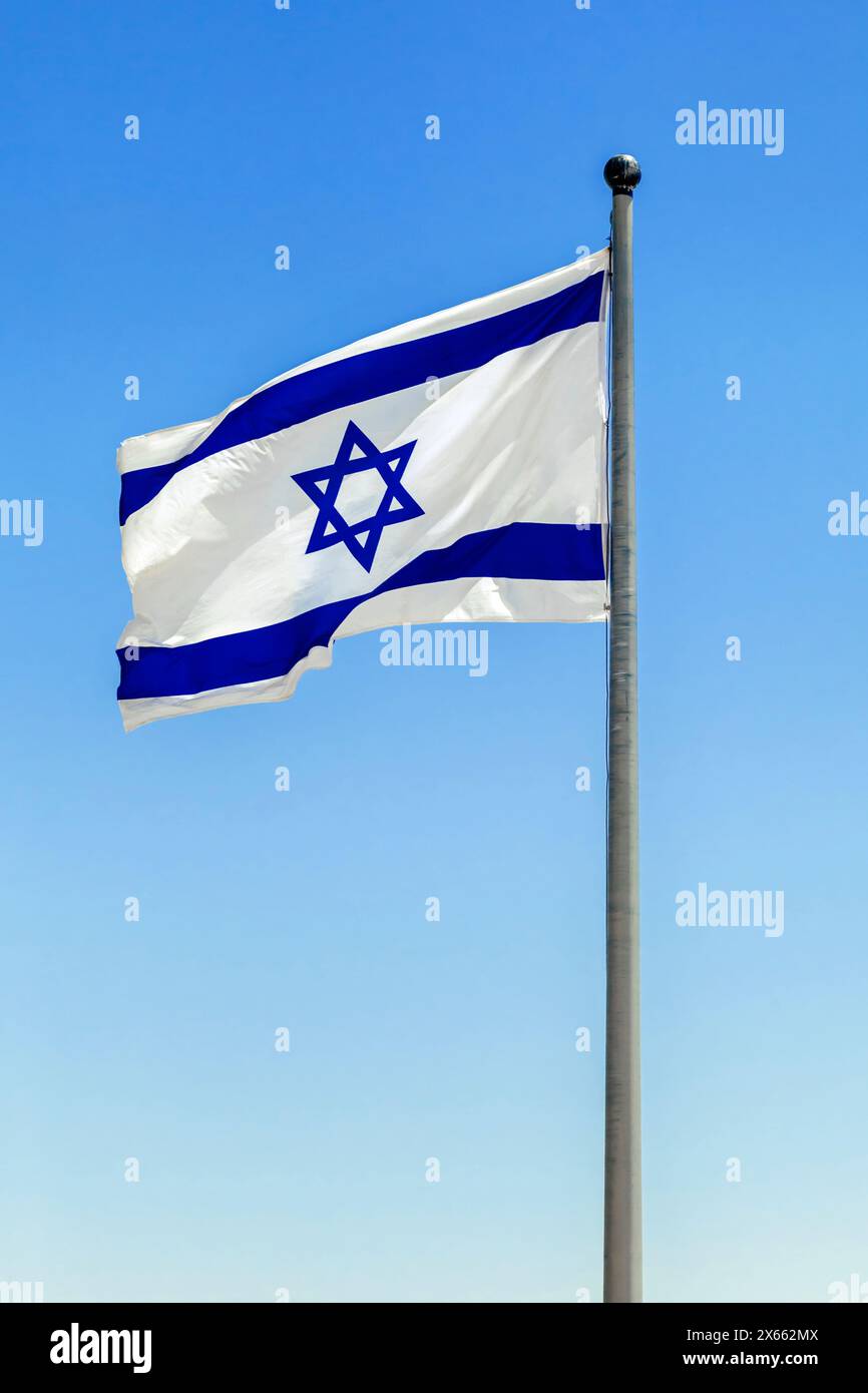 The Israeli flag waving in the bright sunlight Stock Photo - Alamy