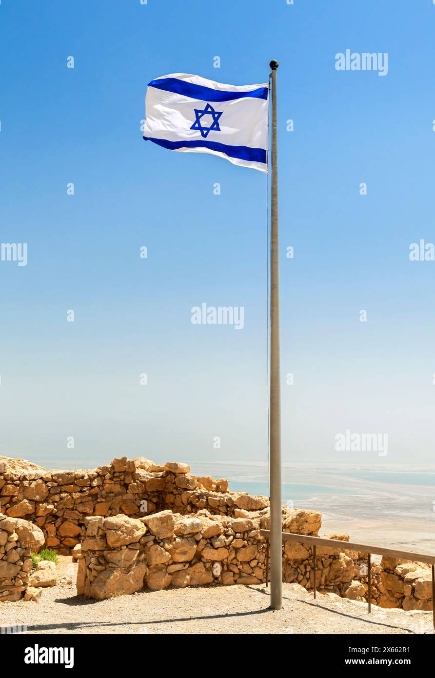 Israel flag over ruins of Masada Fortress Stock Photo - Alamy