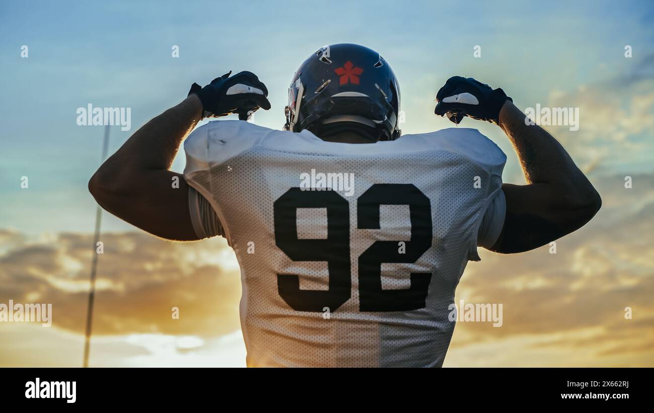 American Football Championship Game: Powerful Player Wearing Helmet ...