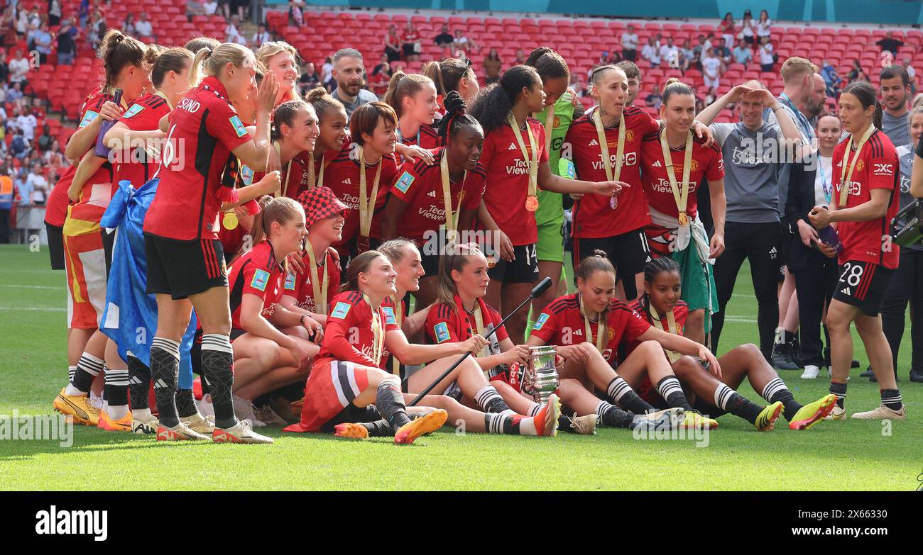 LONDON, ENGLAND - Manchester United Women players celebrates with The ...
