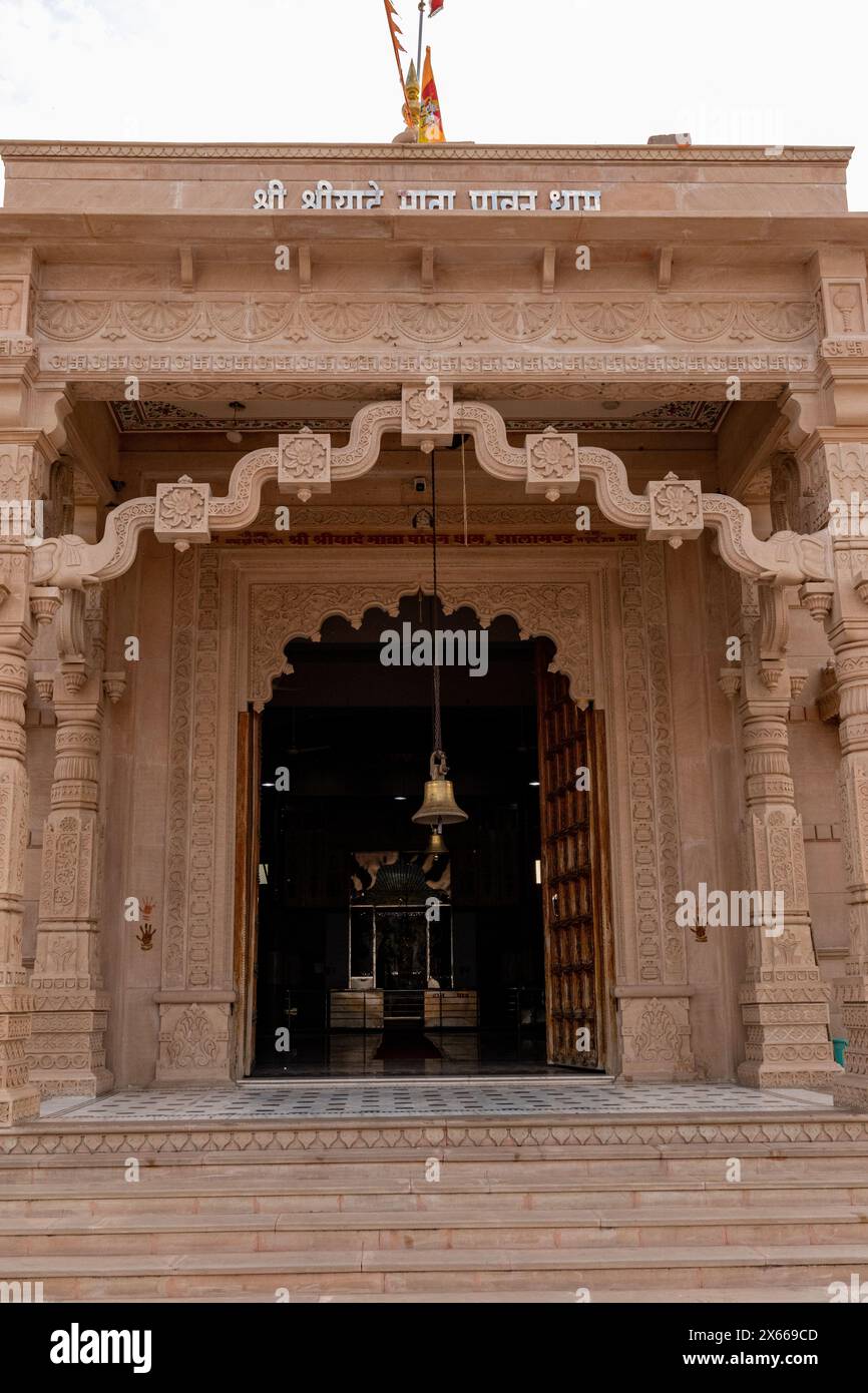 artistic hindu temple entrance at evening from unique perspective Stock ...