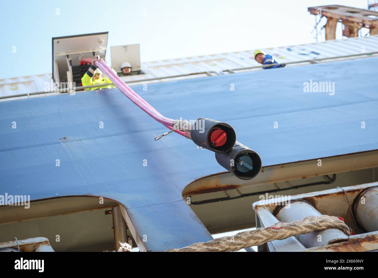 Hamburg, Germany. 13th May, 2024. The shore power cables of a container ...
