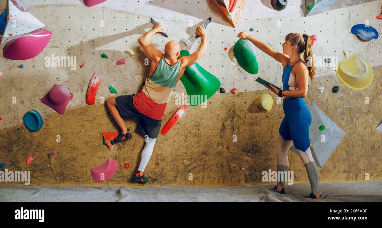 Instructor giving lesson climber hi-res stock photography and images ...