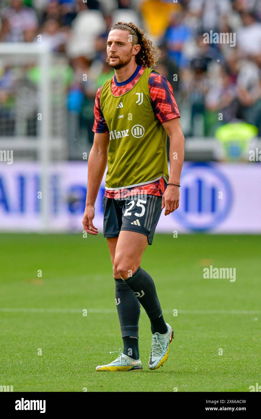 Turin, Italy. 12th, May 2024. Adrien Rabiot (25) of Juventus is warming ...
