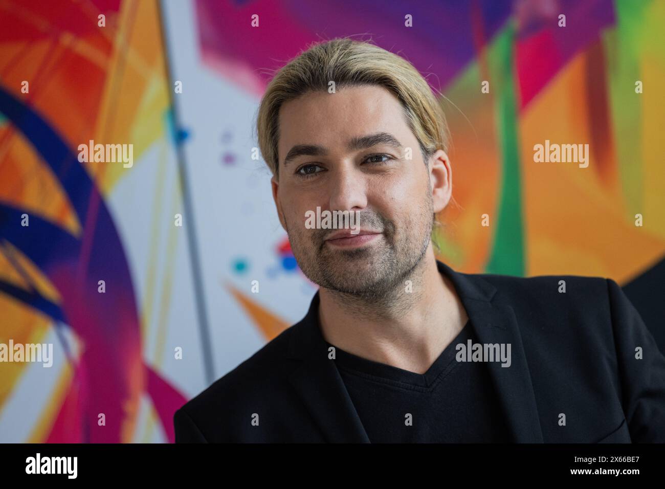 Cologne, Germany. 13th May, 2024. Violinist David Garrett stands at a ...