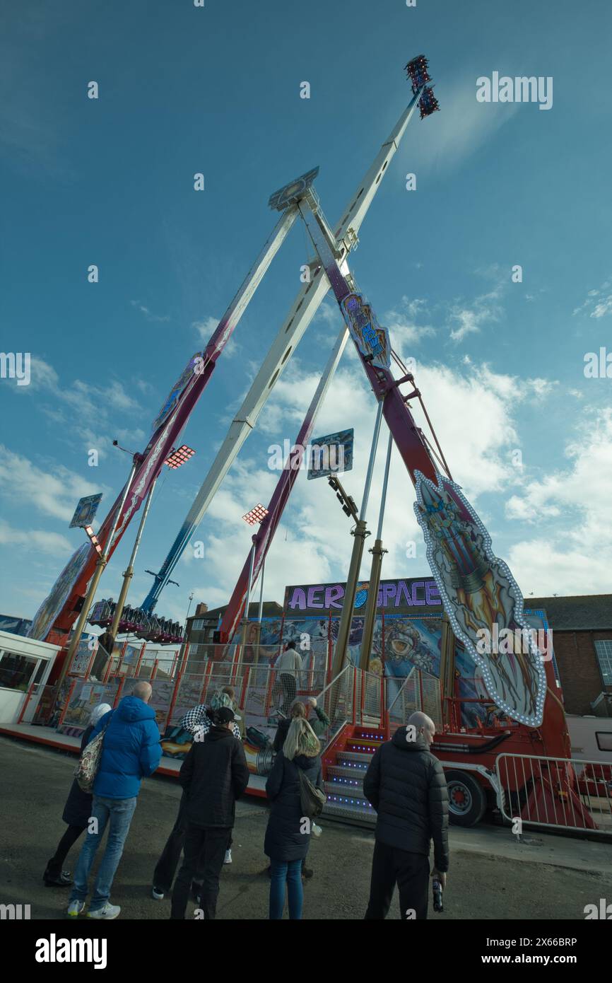 Amusement Ride in Whitmore Bay on Barry Island in Wales in early Spring ...