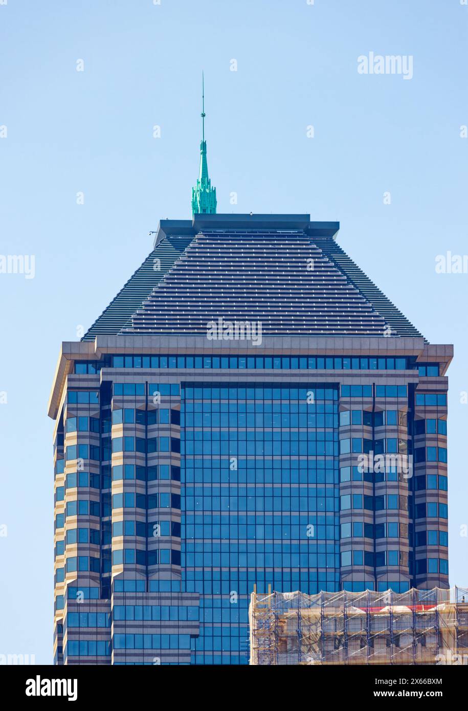 Stone and glass curtain walls and columns emphasize the vertical at 60 ...