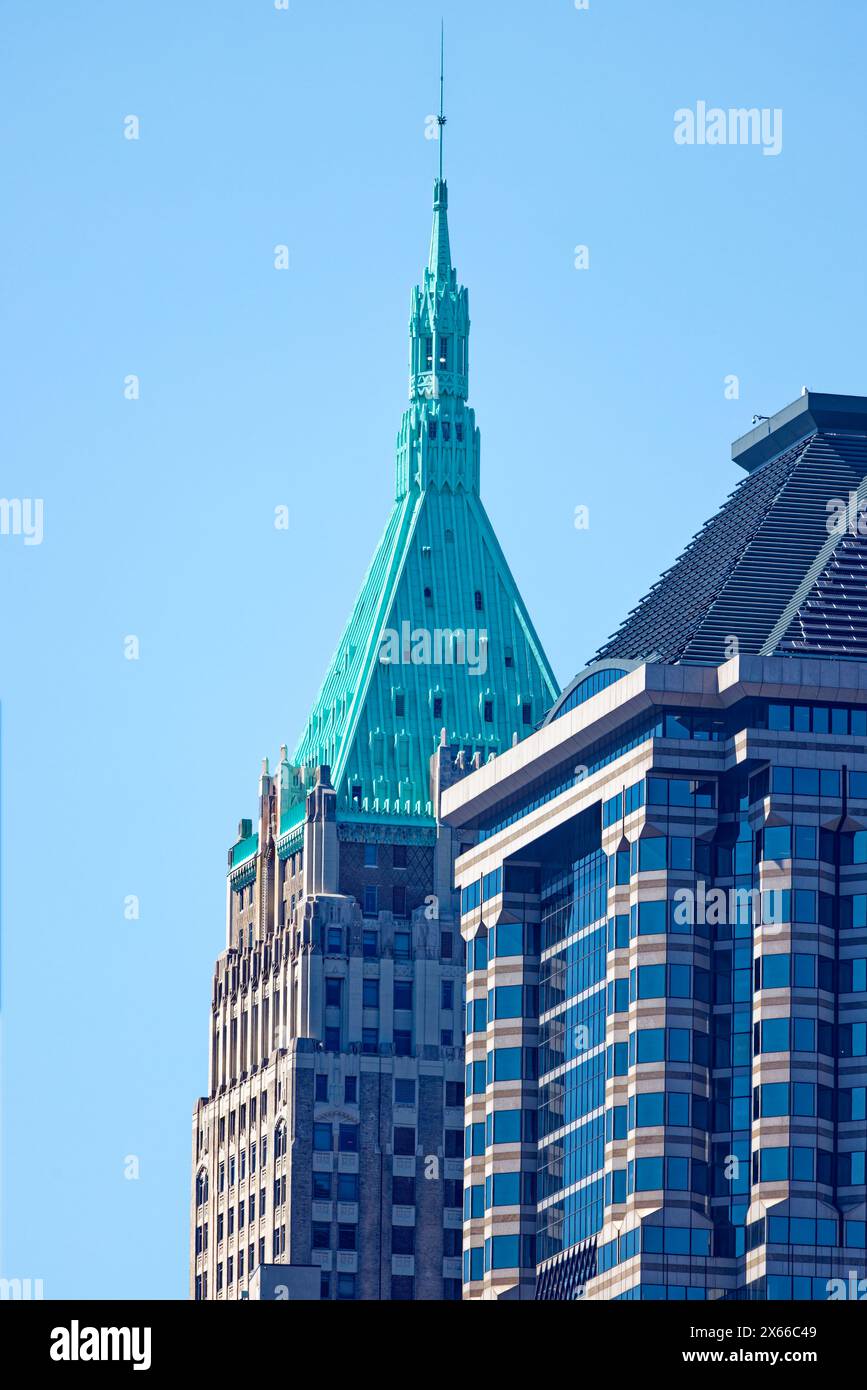 Verdigris pyramid of 40 Wall Street and glass-and-stone 60 Wall Street ...