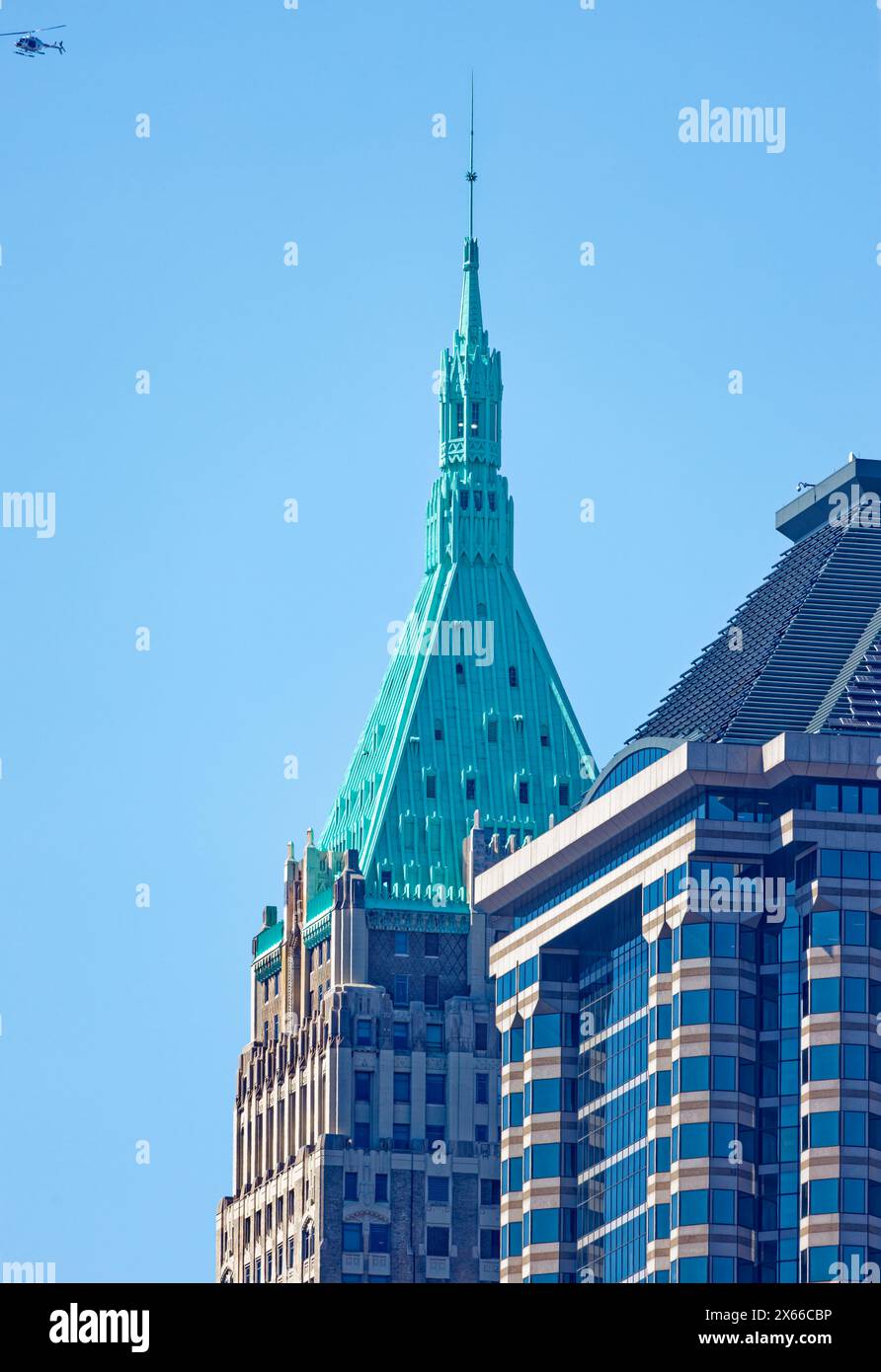 Verdigris pyramid of 40 Wall Street and glass-and-stone 60 Wall Street ...
