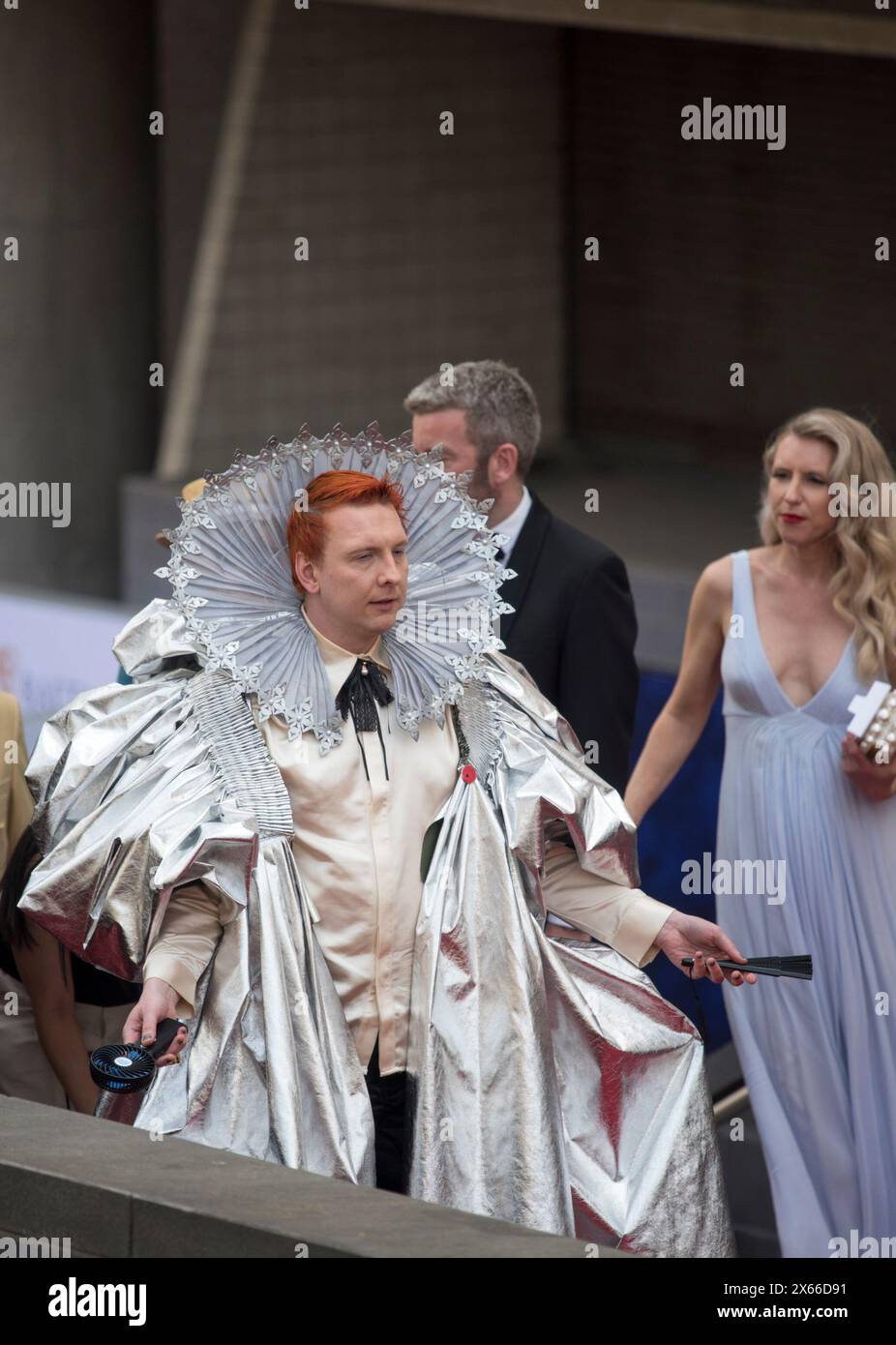 London, UK. 12th May 2024 Joe Lycett, comedian, wearing a mock ...