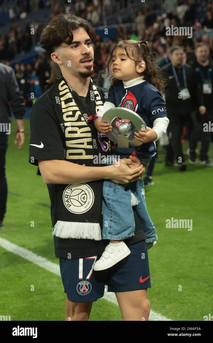 Paris, France. 13th May, 2024. Vitinha of PSG celebrates winning the ...