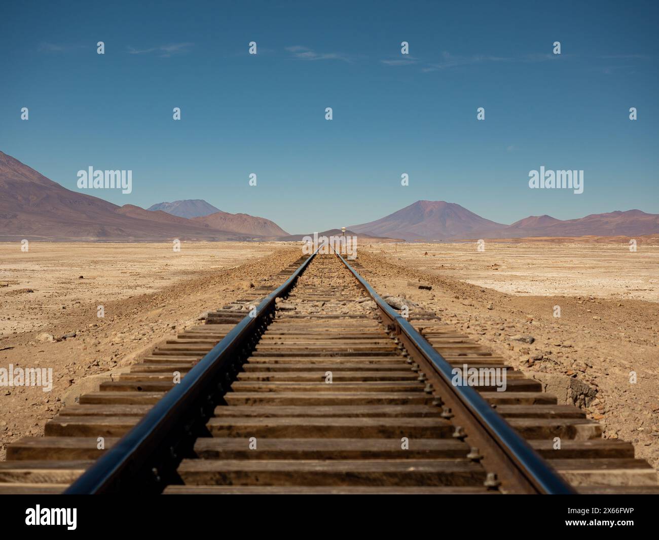 Parallel rail tracks in the Chiguana salt flats, Bolivian highlands ...