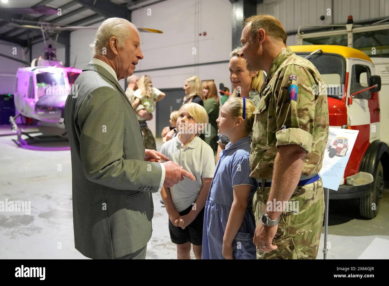King Charles III meets staff members and their families, during a visit ...