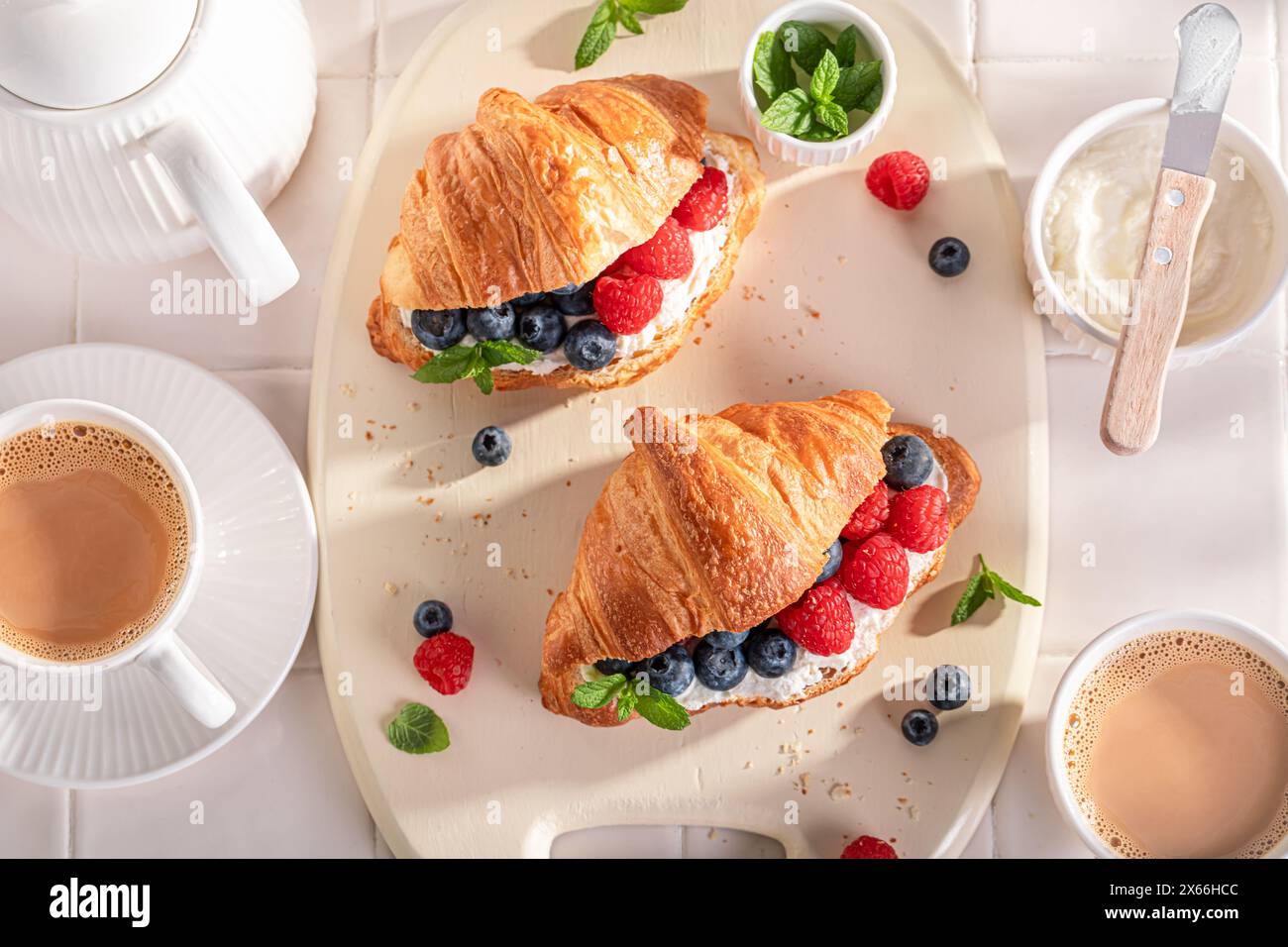 Golden and healthy french croissant for lunch. Croissants with spring ...