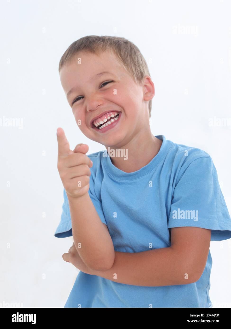 portrait of cheerful little boy on white background in studio Stock ...