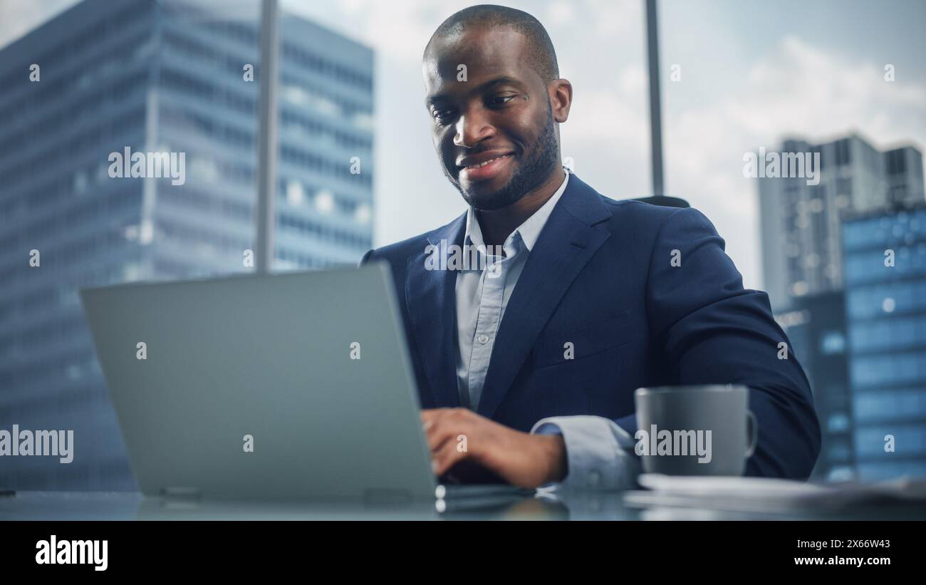 Portrait of Successful Black Businessman in Tailored Suit Working on ...
