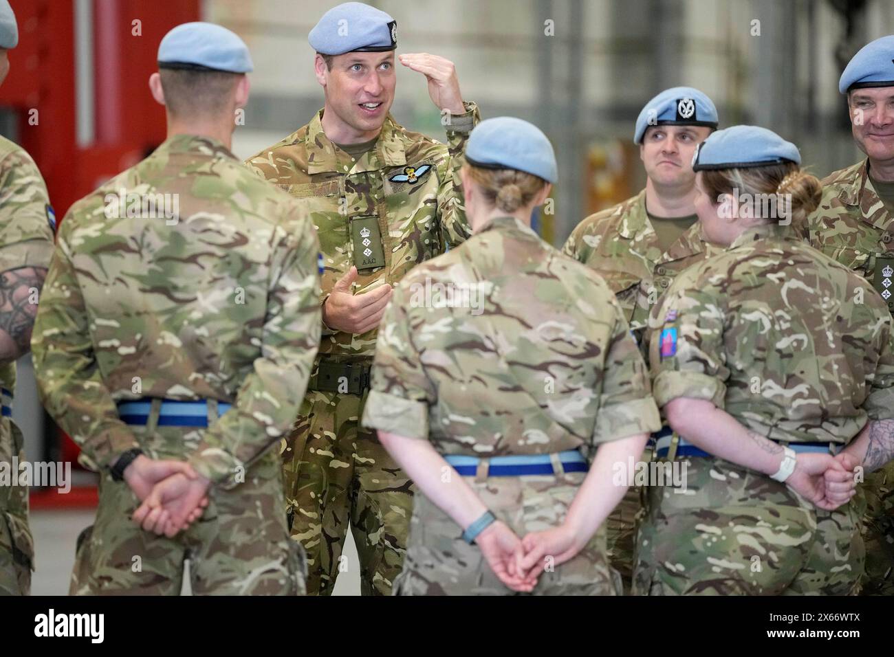 The Prince of Wales speaks with service personnel at the Army Aviation ...