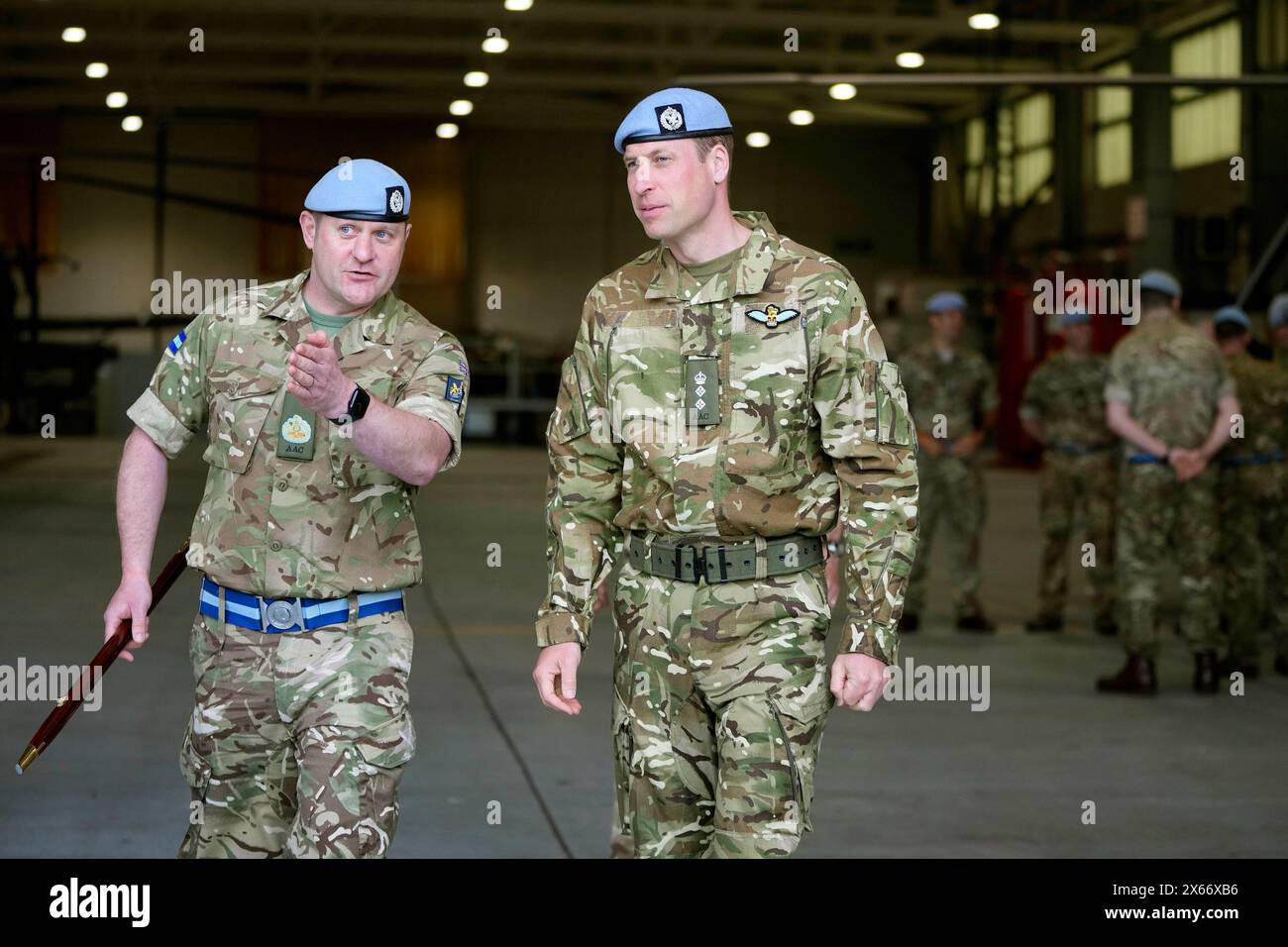 The Prince of Wales (right) with service personnel at the Army Aviation ...