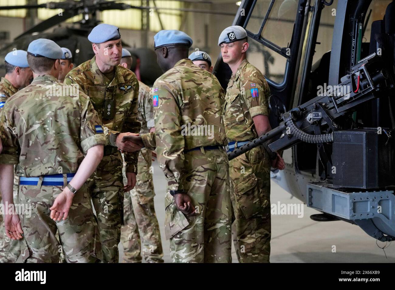 The Prince of Wales greets service personnel at the Army Aviation ...