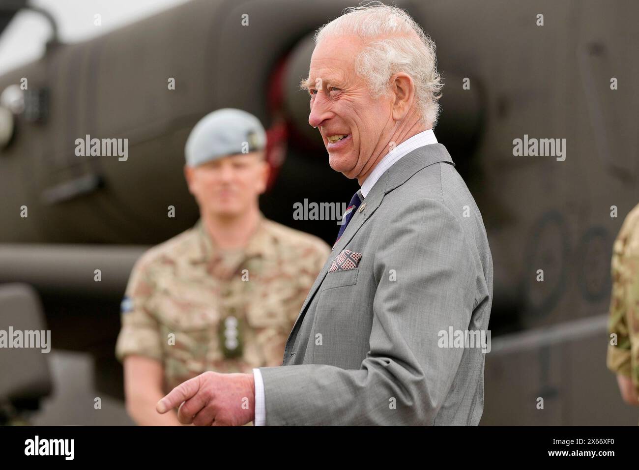 King Charles III speaks to service personnel, during a visit to the ...