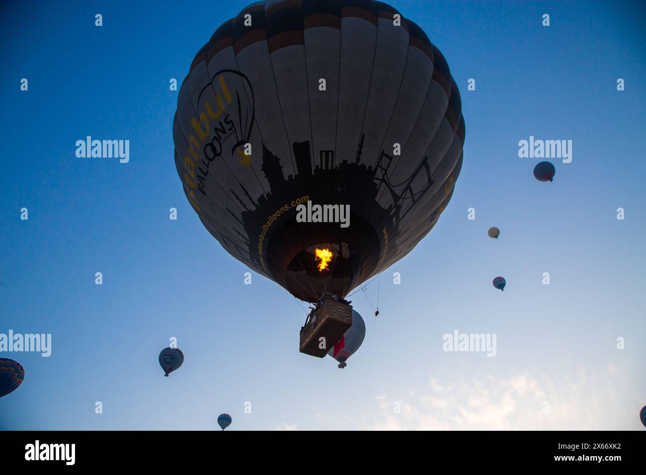 Balloons at dawn in the landscape of cappadocia Stock Photo - Alamy
