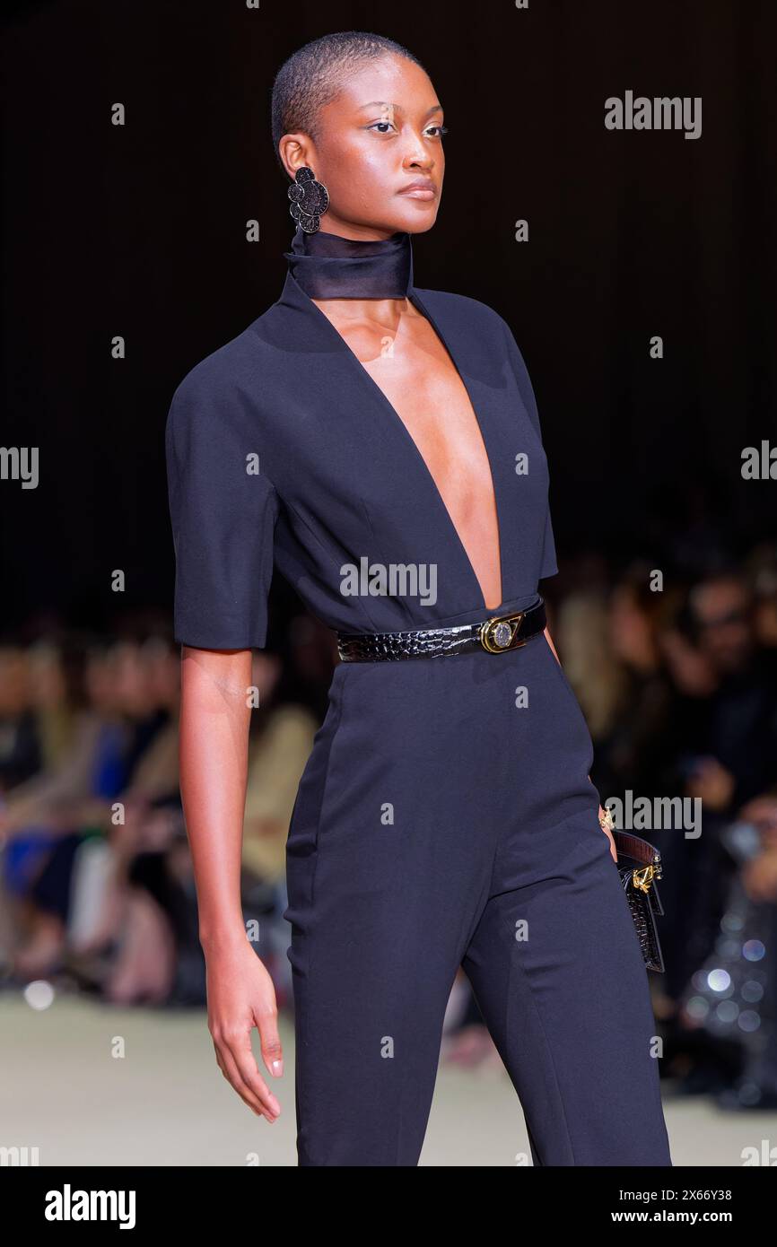 Sydney, Australia. 13th May, 2024. A model walks the runway during the ...