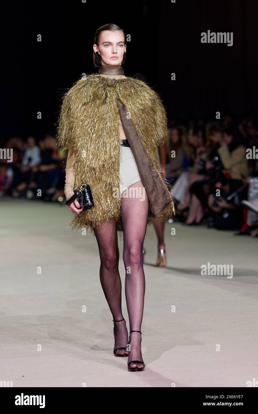 Sydney, Australia. 13th May, 2024. A model walks the runway during the ...