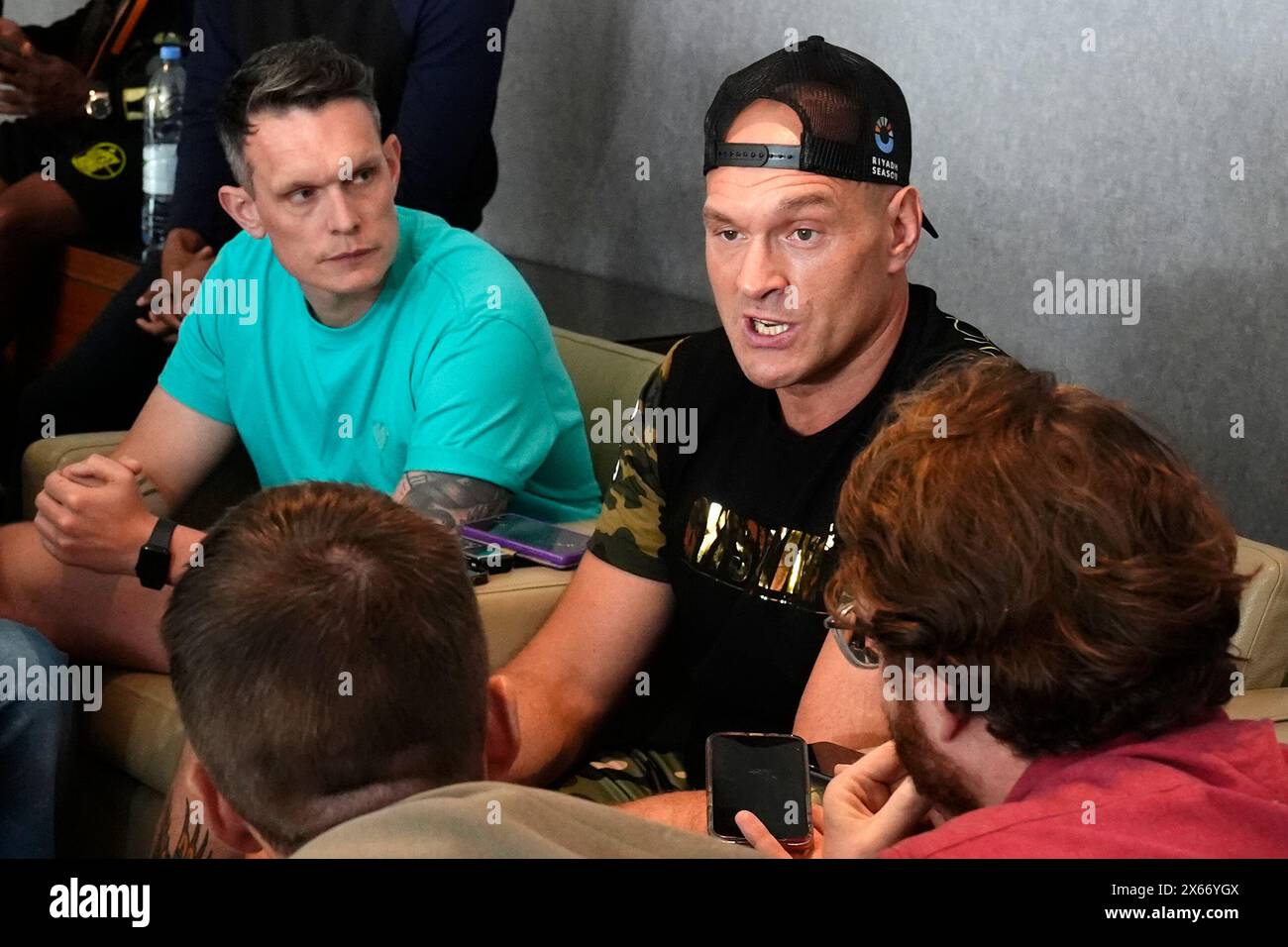 Boxer Tyson Fury (centre) during a media day in Riyadh. The IBF, WBA ...