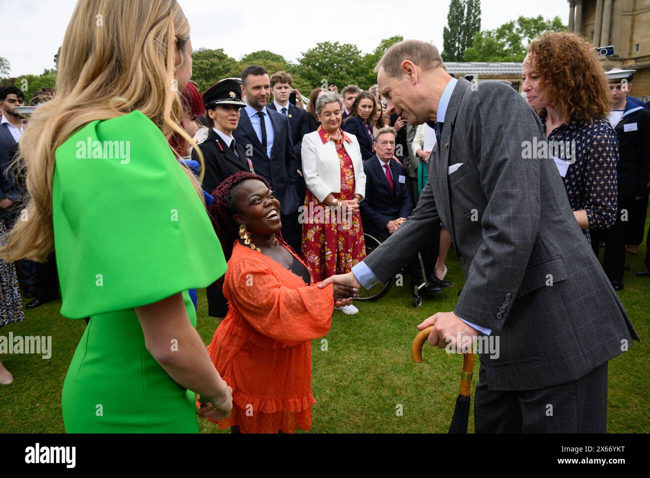 Comedian Fatima Timbo shakes hands with the Duke of Edinburgh during ...